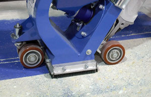 What is a shot blaster? When is it a good choice for surface preparation?